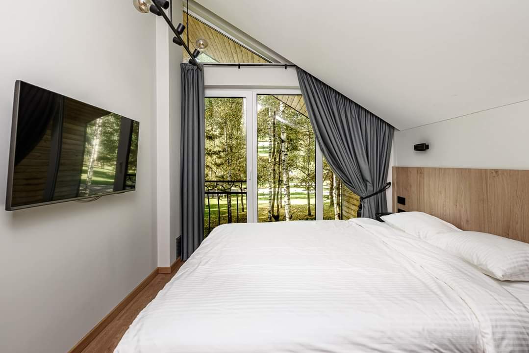 Poilsis privačiame Molėtai Resort namelyje